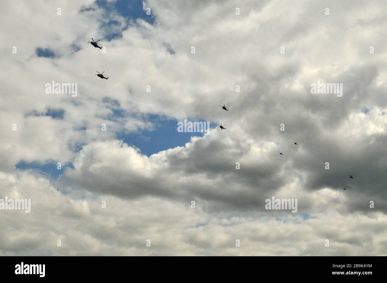 Military helicopters fly in formation hi-res stock photography and ...
