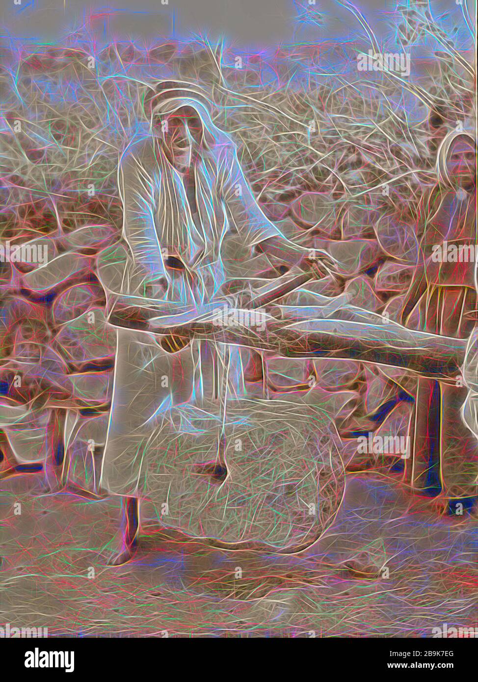 Olive crushing and pressing. Process of winding the suspended weight on ...