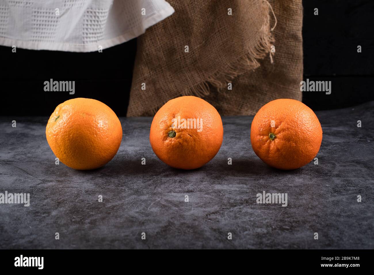 Oranges with a small shadow on them Stock Photo - Alamy