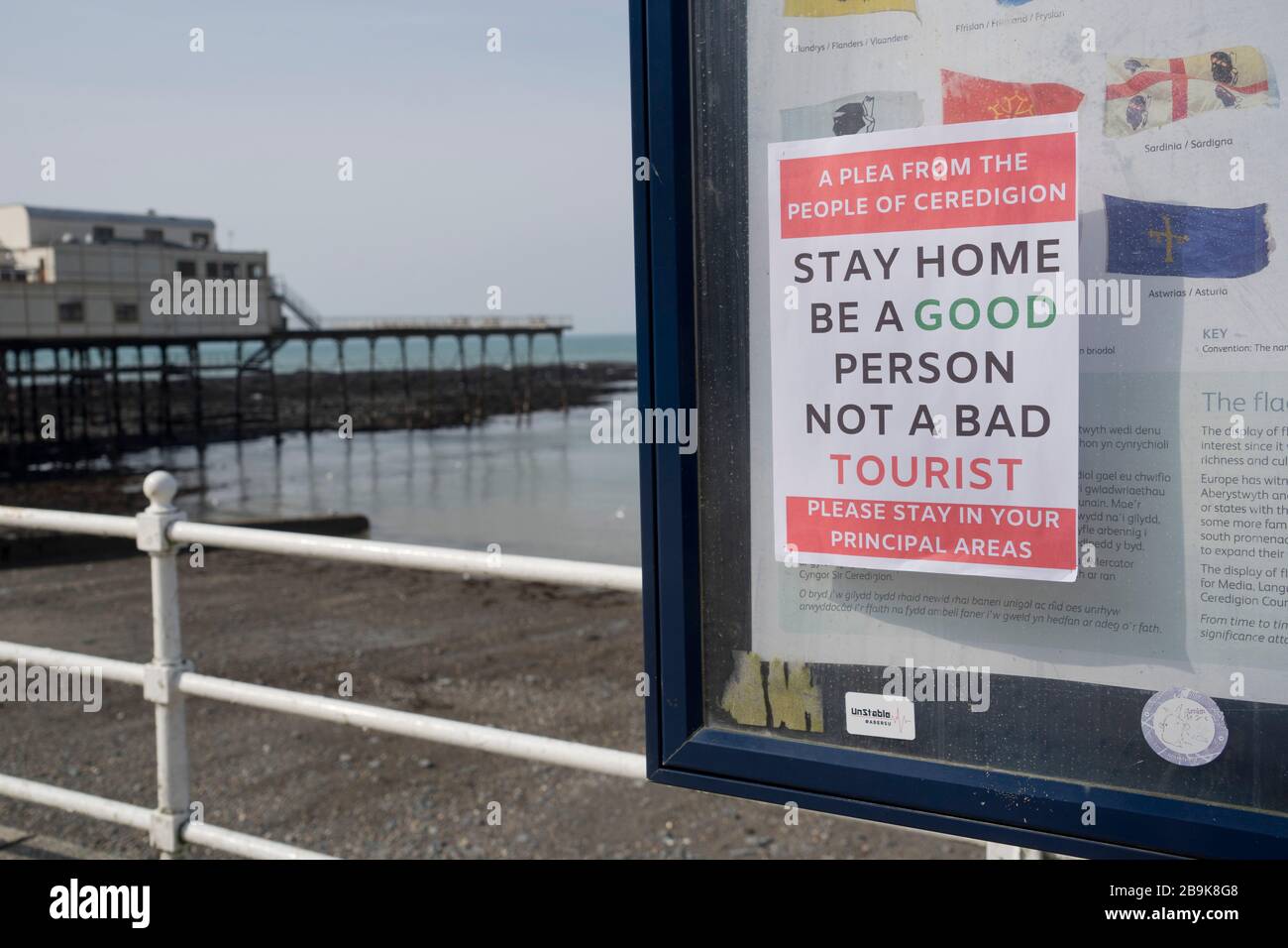 Empty beach promenade with signs asking tourists to stay away after UK ...