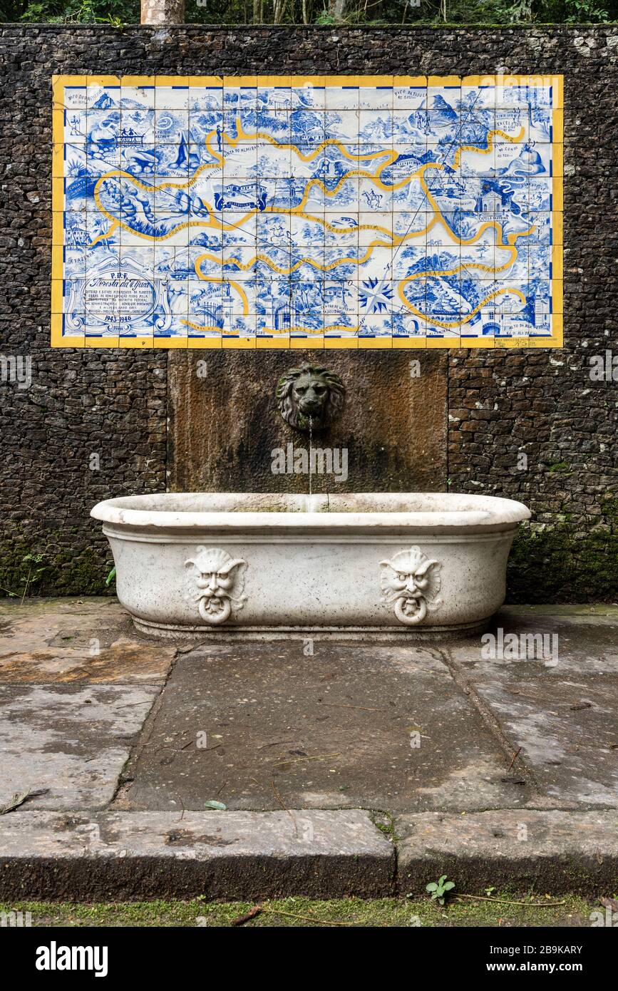 Old historic monument with map made of tiles and water fountain in the ...