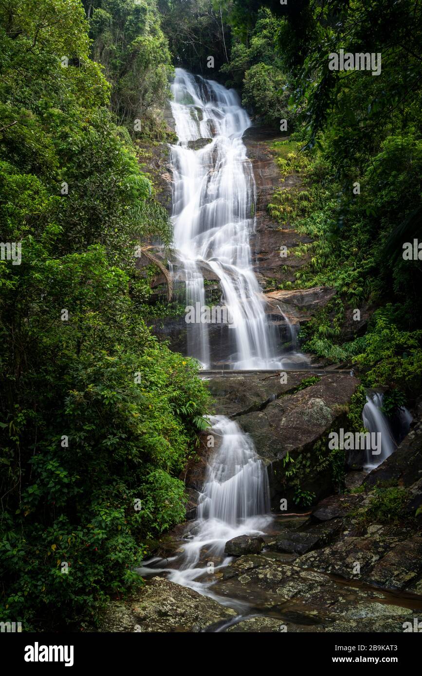 Beautiful Atlantic Rainforest waterfall on green landscape in Tijuca ...