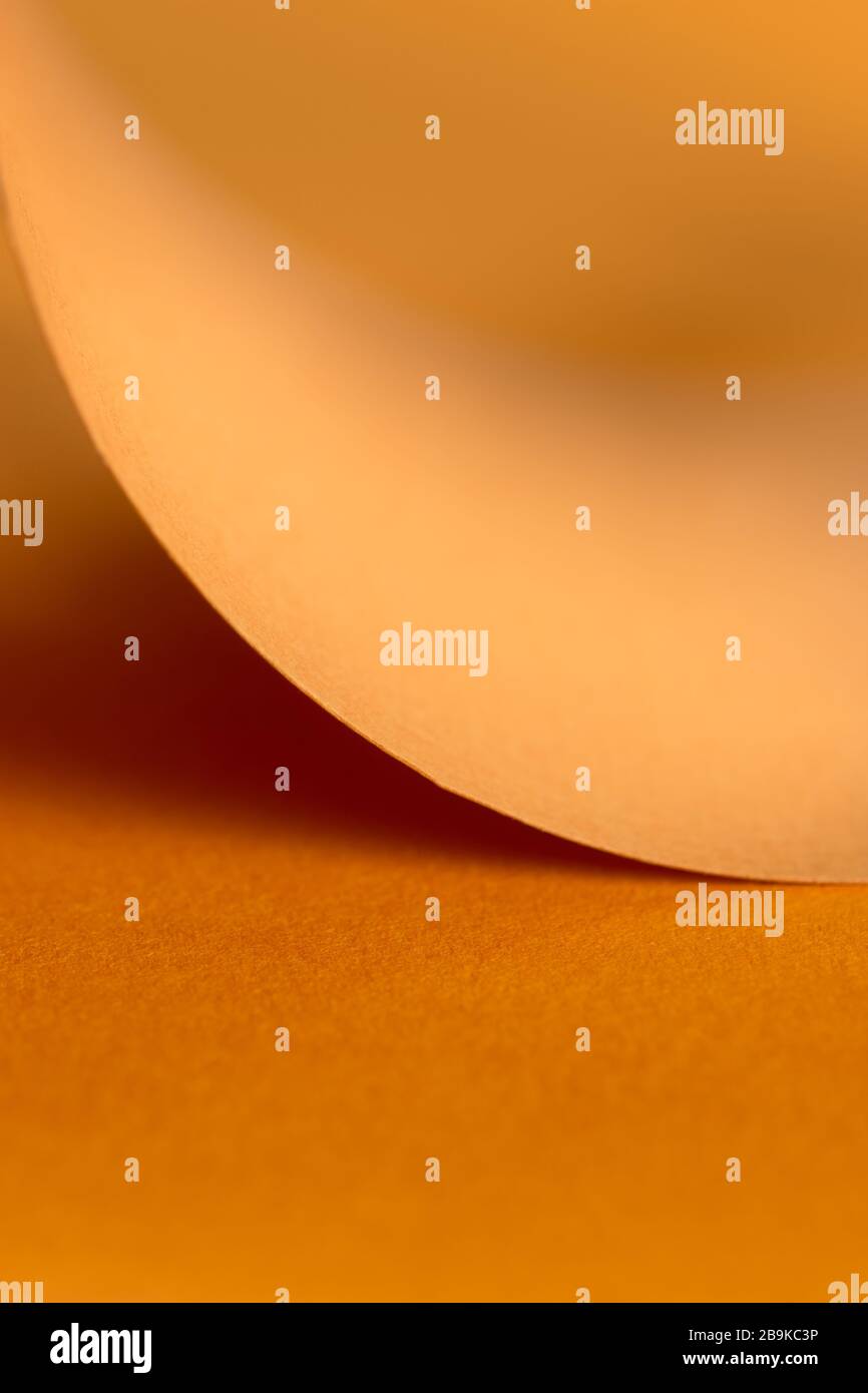 Orange minimalist color paper designs Stock Photo - Alamy