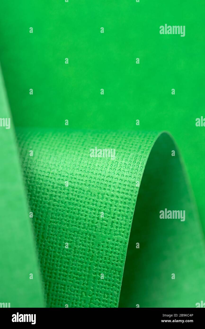 Green color paper design background Stock Photo - Alamy