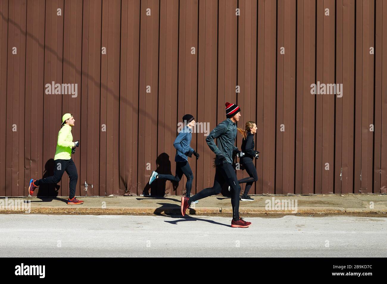 A group of athletes on a training run Stock Photo - Alamy