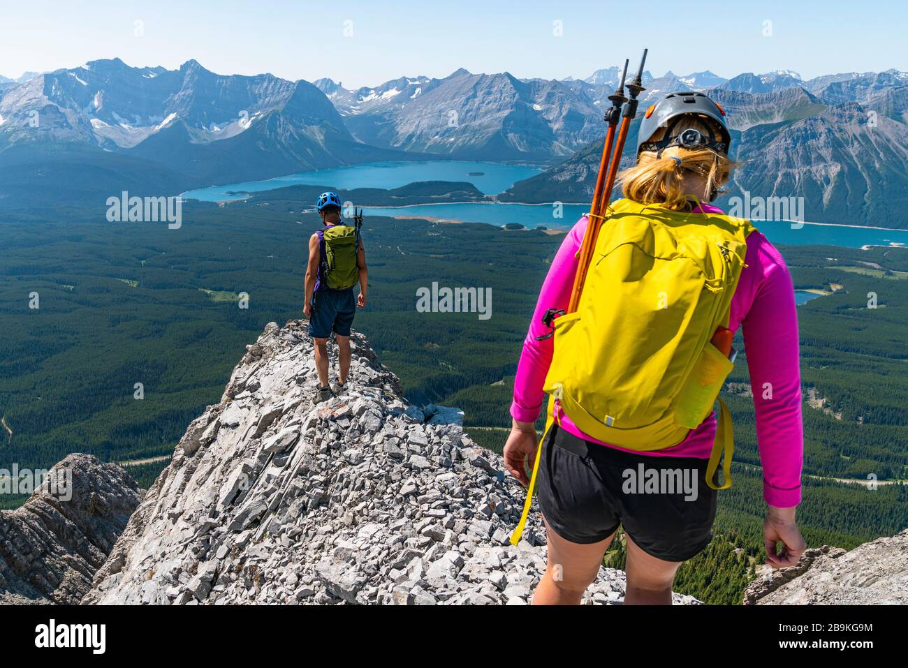 Couple Hiking Together On Mountain Ridgeline Above Kananaskis Alberta ...