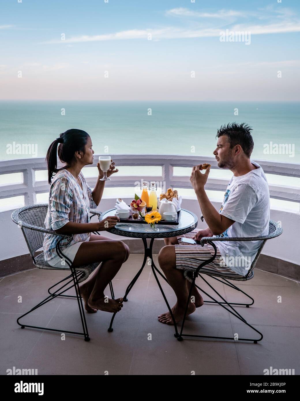 Couple luxury balcony view hi-res stock photography and images - Alamy