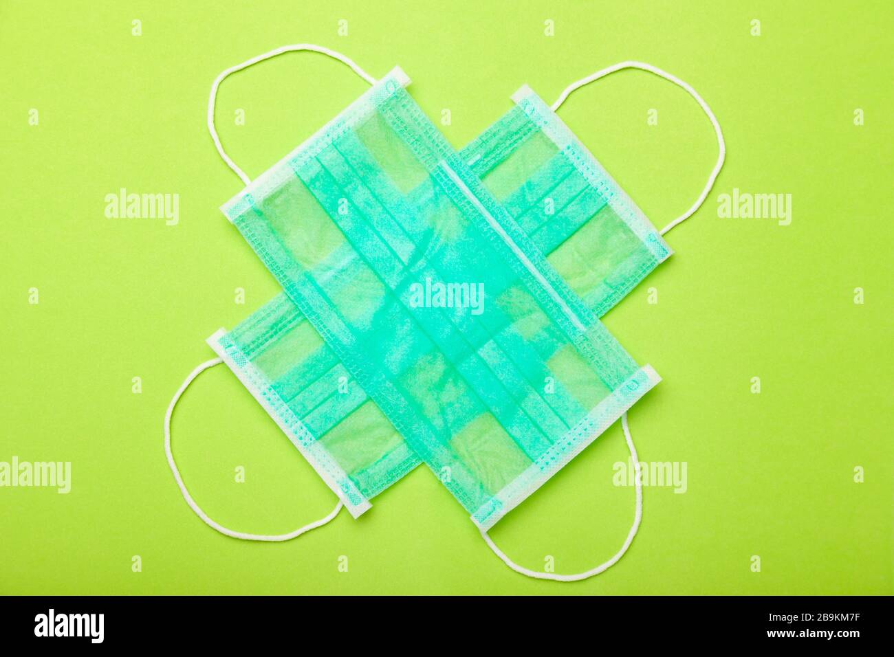 face Mask from above on a green Background Stock Photo - Alamy