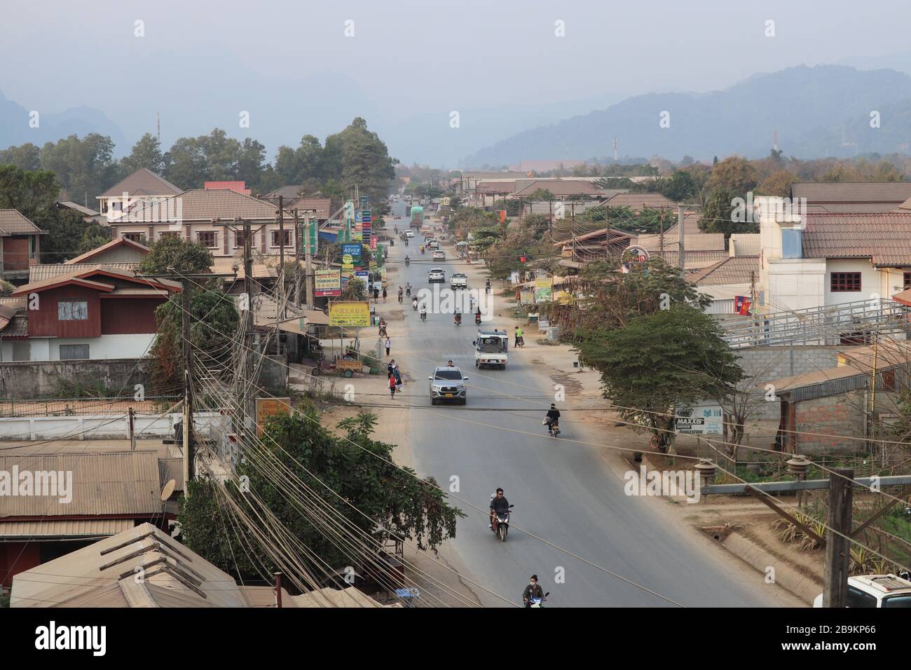 ROADS RUNNING THROUGH THE TOWN OF VANG VIENG IN NORTHERN LAOS Stock ...