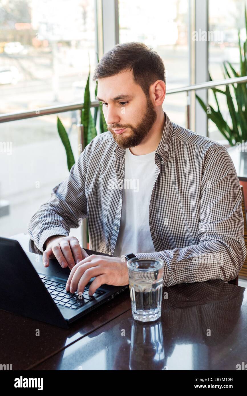 Happy handsome businessman drinks water hi-res stock photography and ...