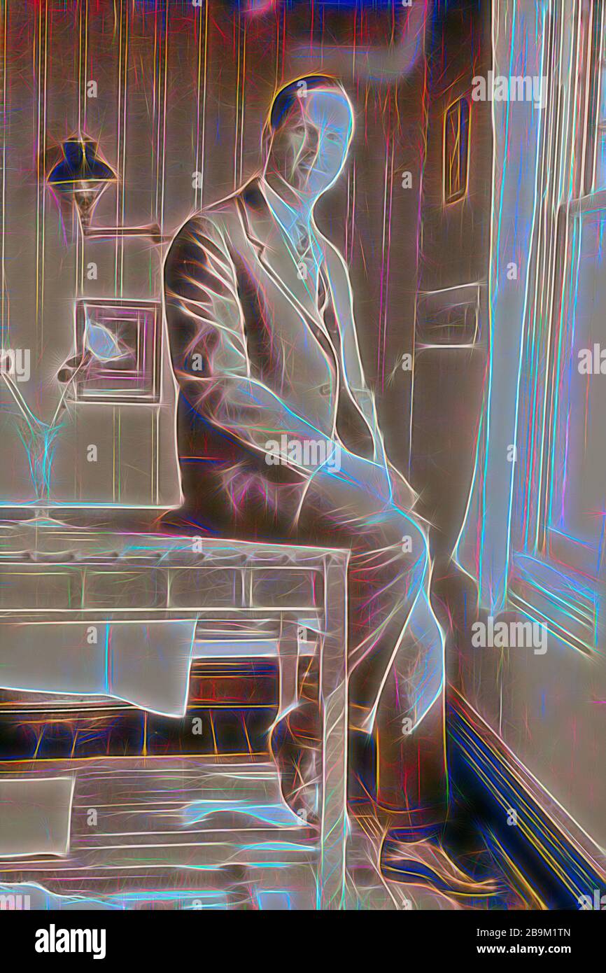 Lars Lind? Sitting on edge of desk. 1925, Middle East Stock Photo - Alamy