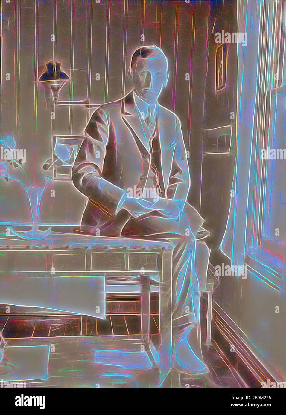 Eric Matson sitting on edge of desk. 1925, Middle East, Israel and/or ...