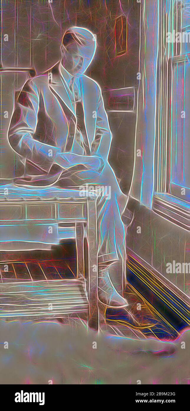 Eric Matson sitting on edge of desk. 1925, Middle East, Israel and/or ...