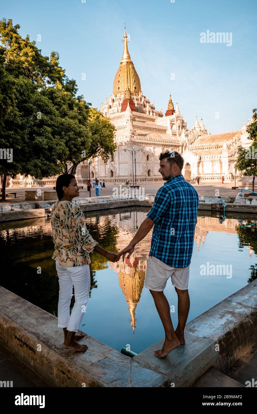 Bagan Myanmar, couple watching temple, Ananda Temple Bagan, Old temple ...