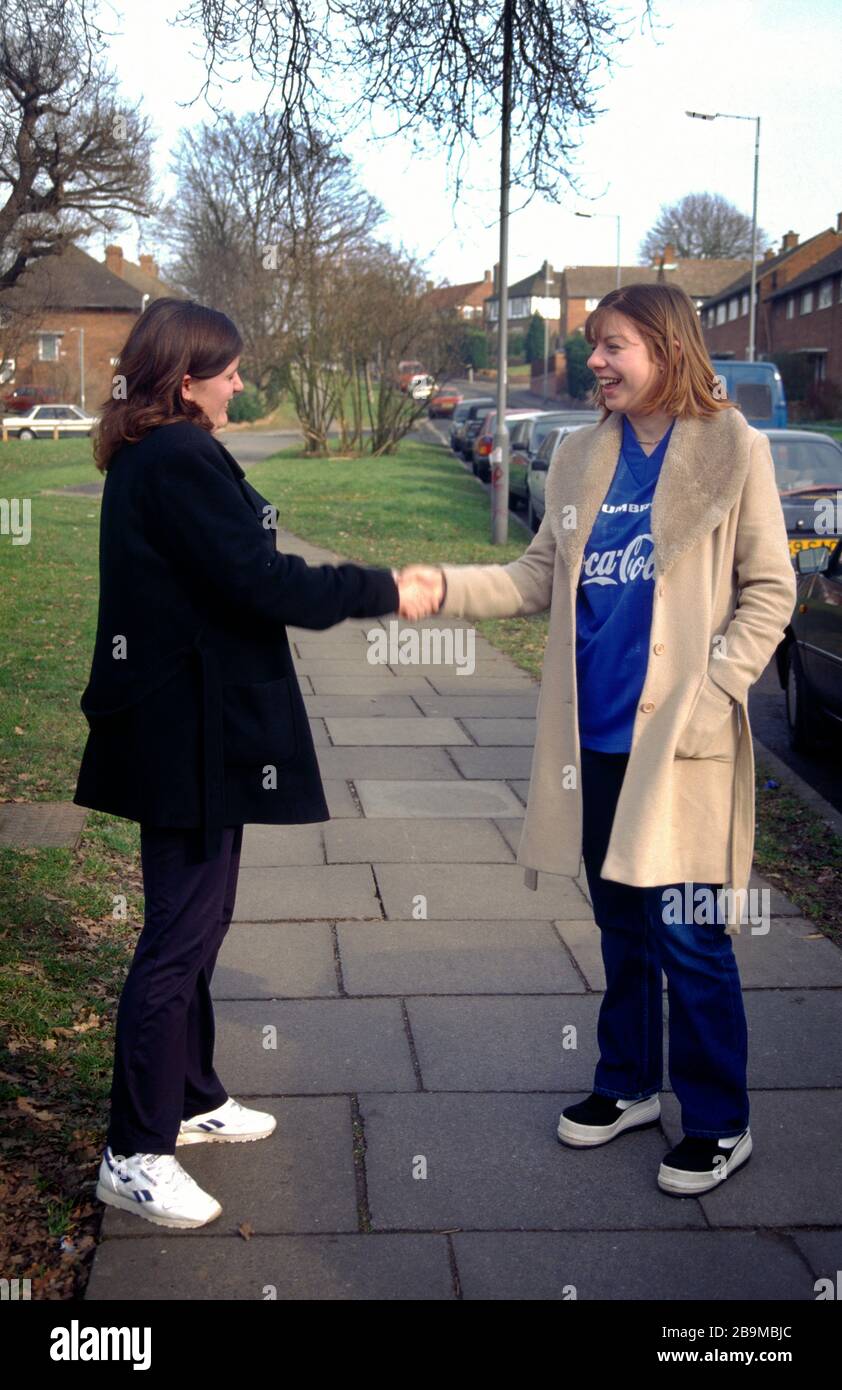 Teenage handshake hi-res stock photography and images - Alamy