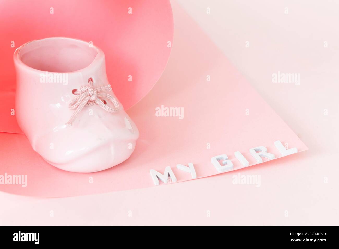 Top view of beautiful porcelain mug pink baby shoe shape and My girl ...