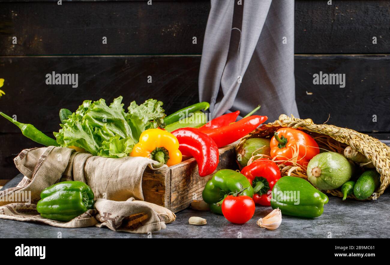 Vegetable and greenery set in a rustic background Stock Photo - Alamy
