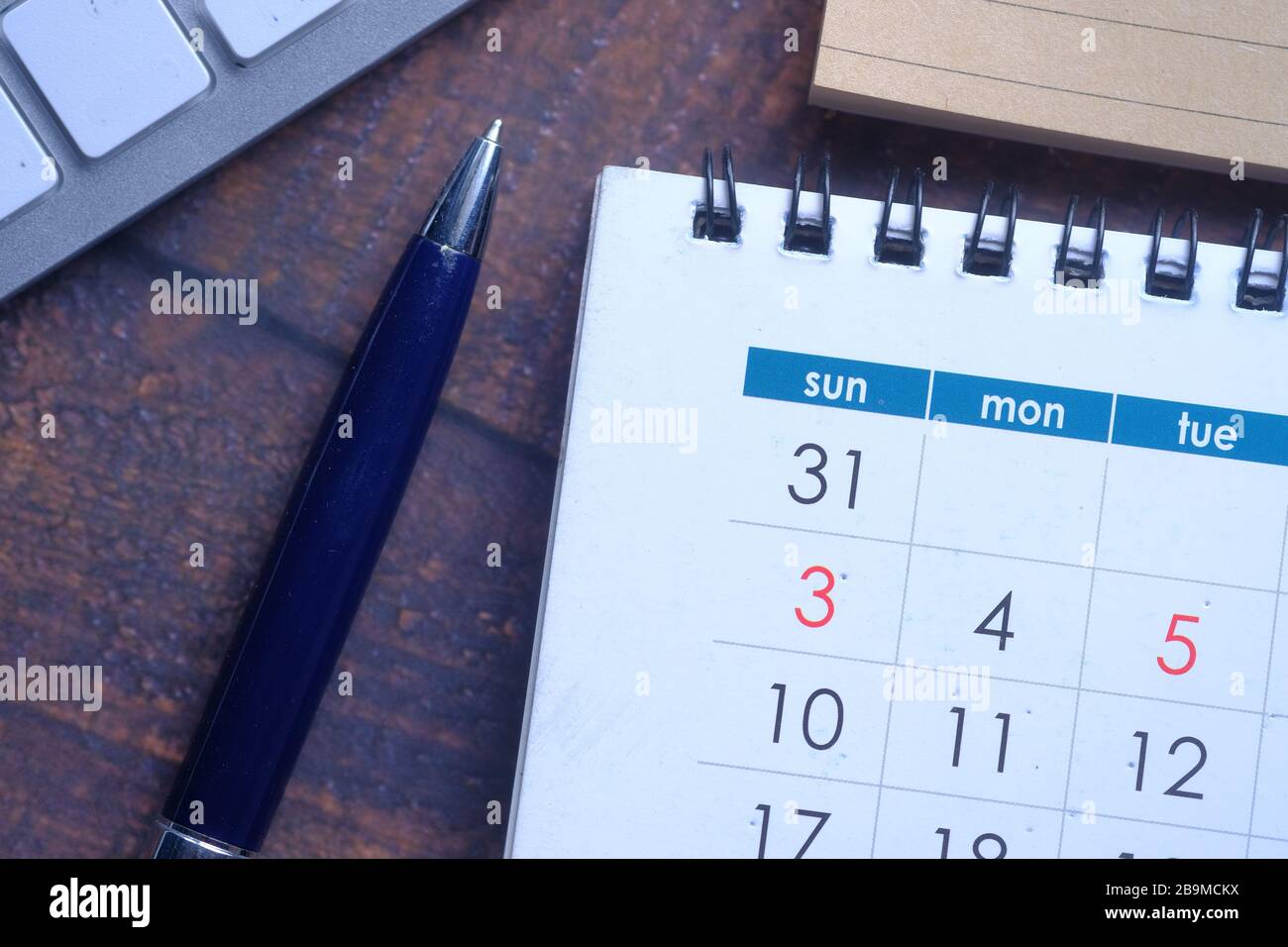 top view of calendar, pen on white background Stock Photo - Alamy