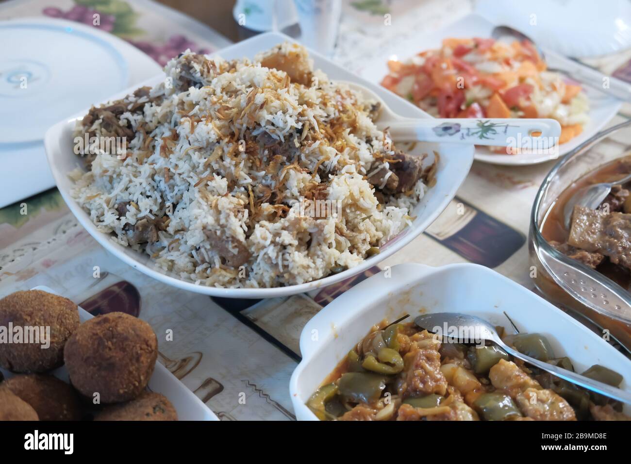 Close up of indian rice and curry on plate on table Stock Photo - Alamy