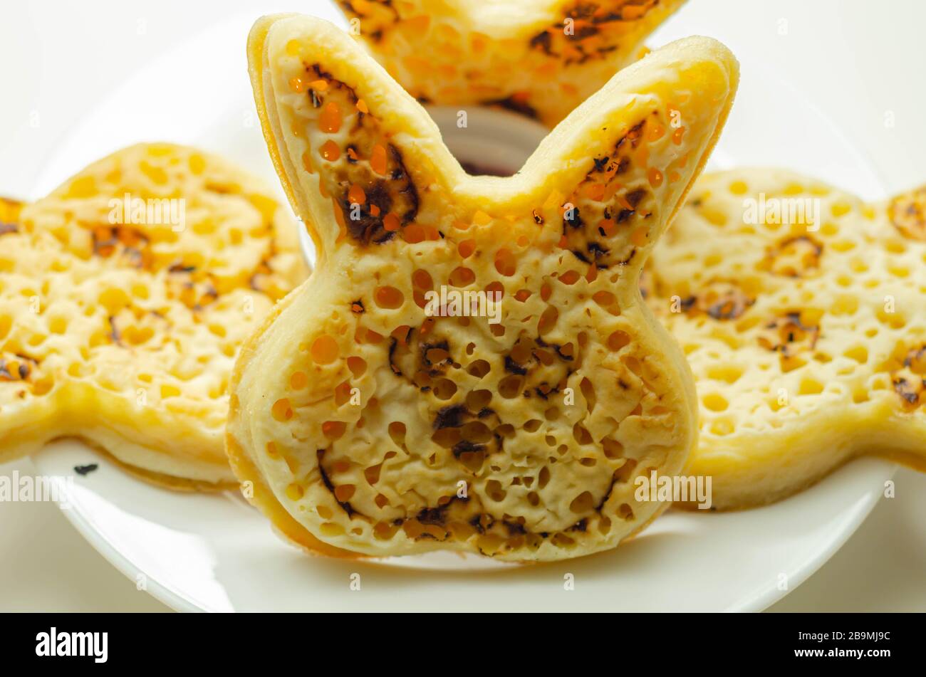 Easter nice bunny shaped crumpets served with raspberry jam, funny food ...