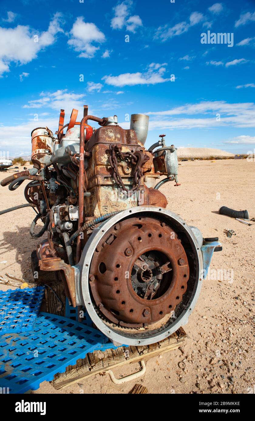 Old rusty engine in a Mojave desert junkyard Stock Photo - Alamy