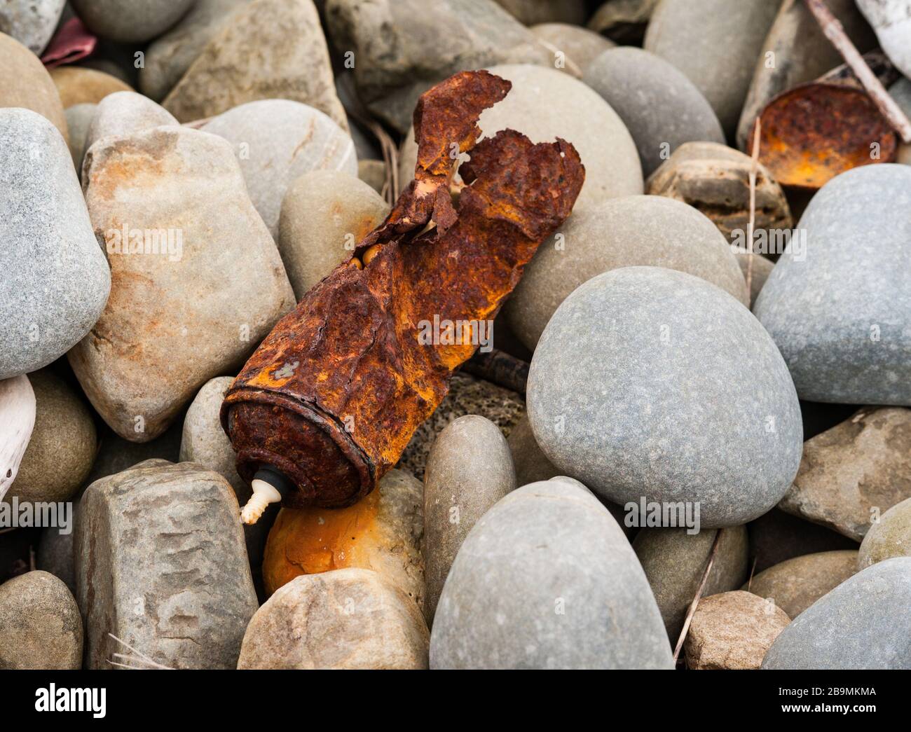 old rusty aerosol can washed up on rocky coast, west coast of Ireland ...