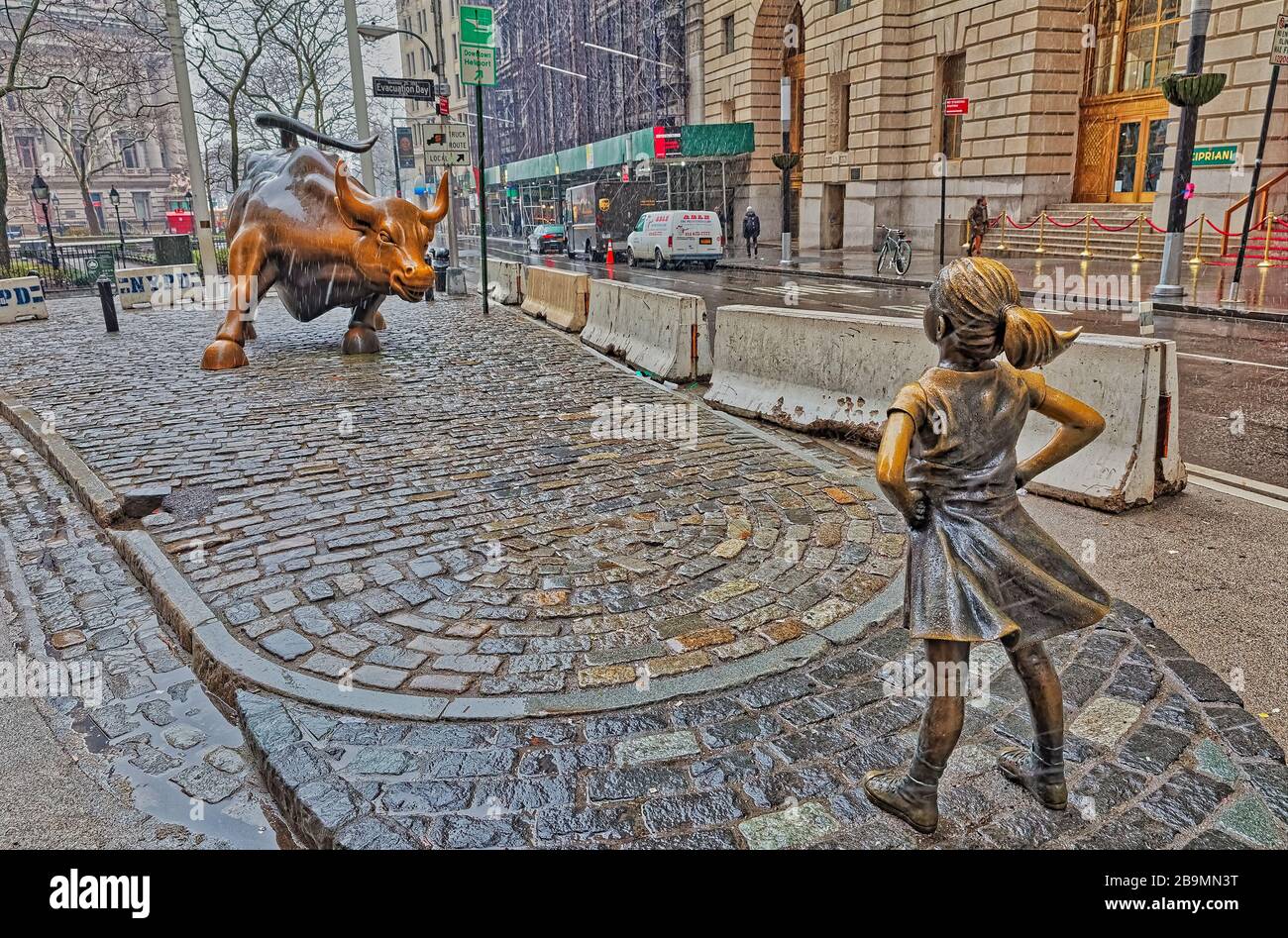 The Fearless Girl statue facing Charging Bull in Lower Manhattan New ...