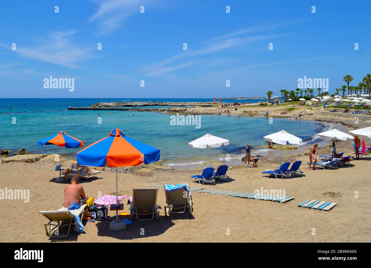 Tourists on Paphos beach a popular tourist resort in Cyprus Stock Photo ...