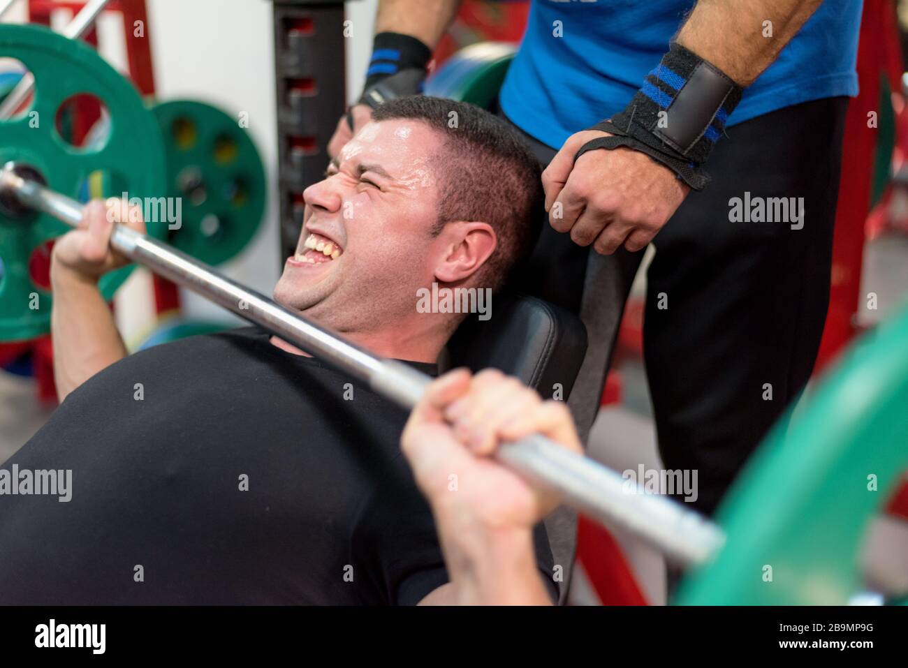 Bodybuilding Motivation. Two Bodybuilders Train Together at the Gym ...
