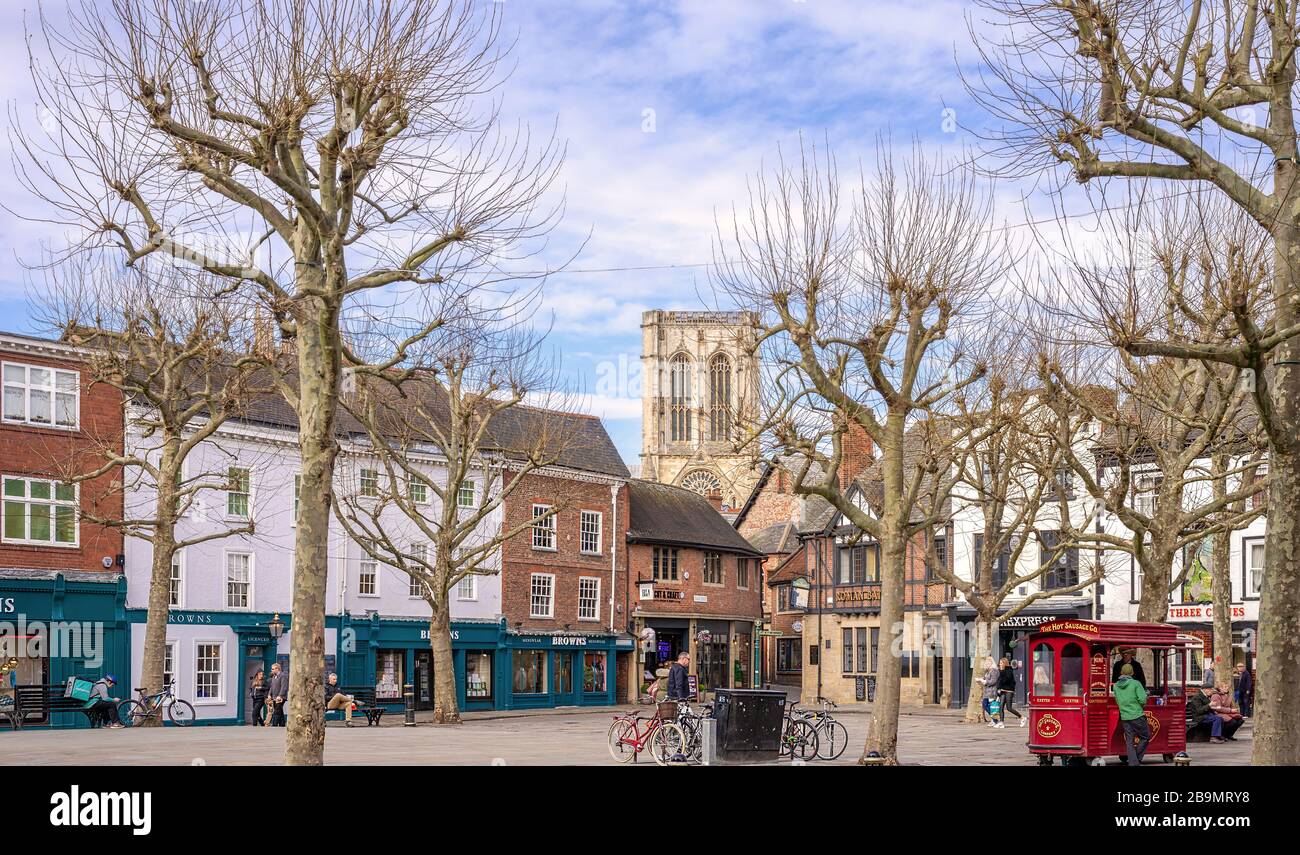 St Sampson Square in York lined with shops, restaurants and a pub. A ...