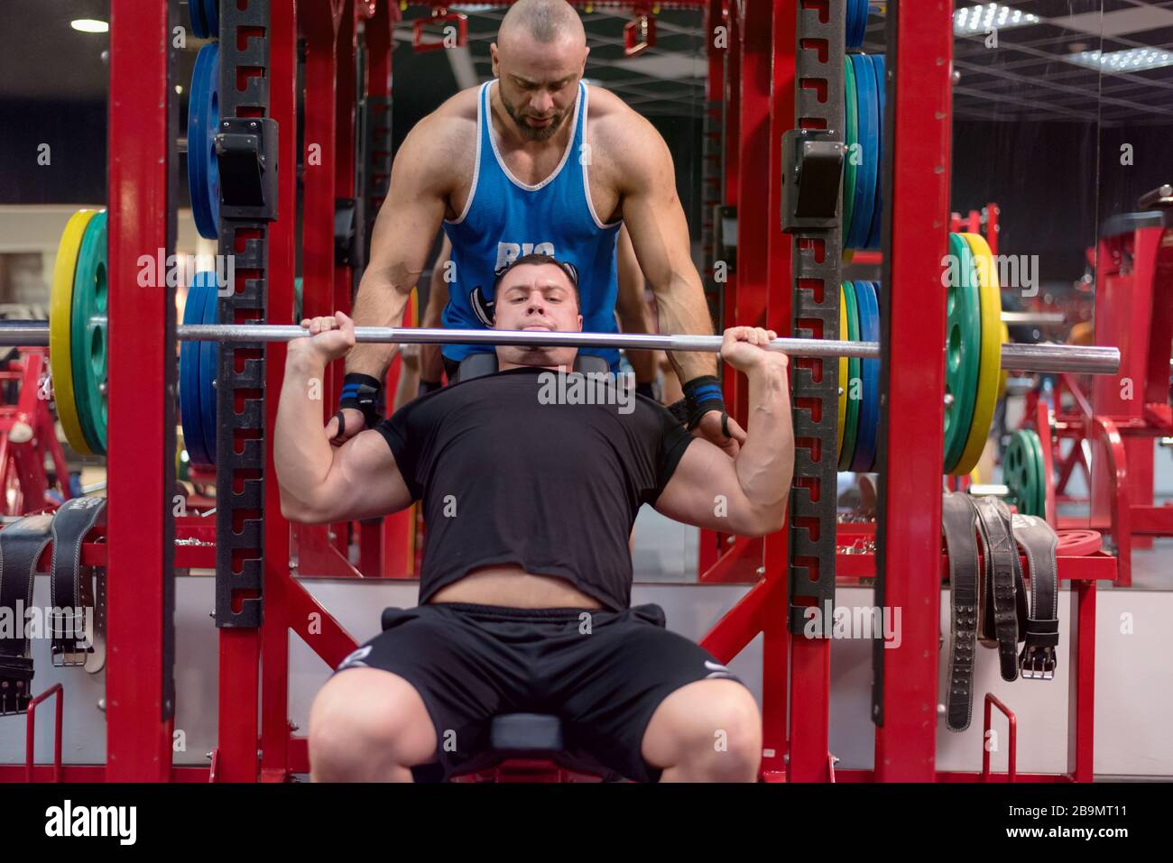 Bodybuilding Motivation. Two Bodybuilders Train Together at the Gym ...