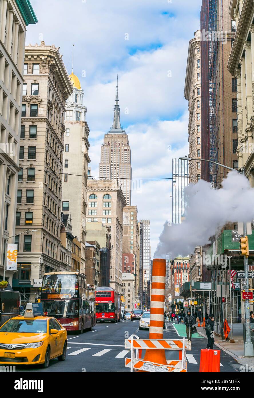 The steam rises and drifts among the Midtown Manhattan buildings in New ...