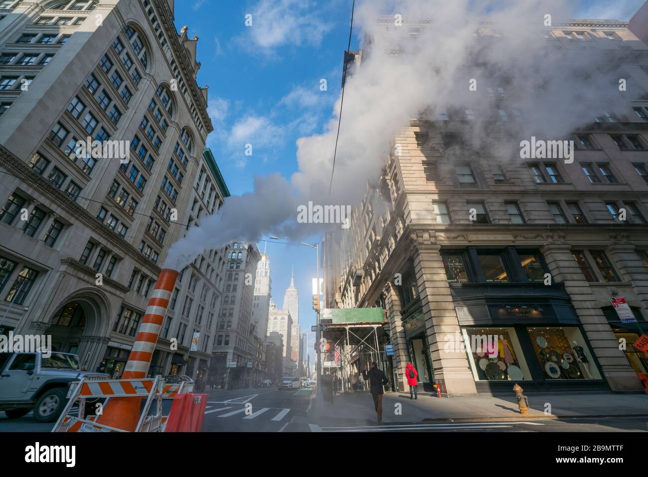 The steam rises and drifts among the Midtown Manhattan buildings in New ...