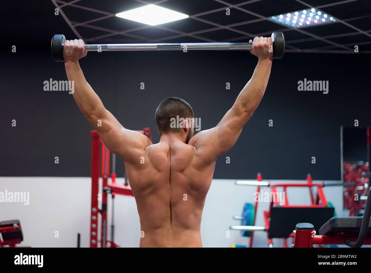 Hard Core Bodybuilding. Muscular athletic bodybuilder fitness model ...