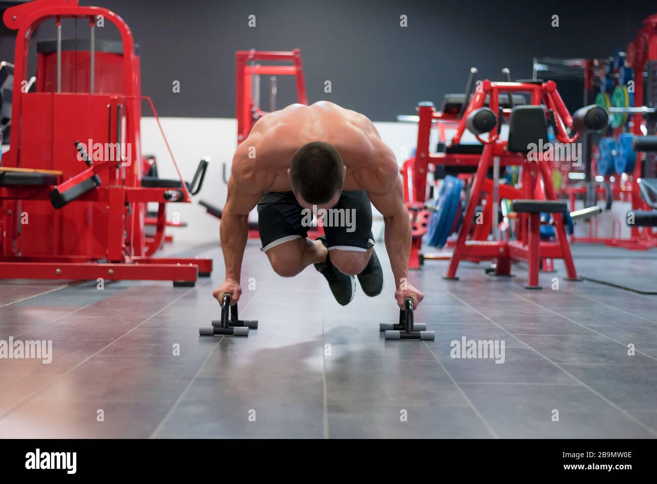 Hard Core Bodybuilding. Muscular athletic bodybuilder fitness model ...