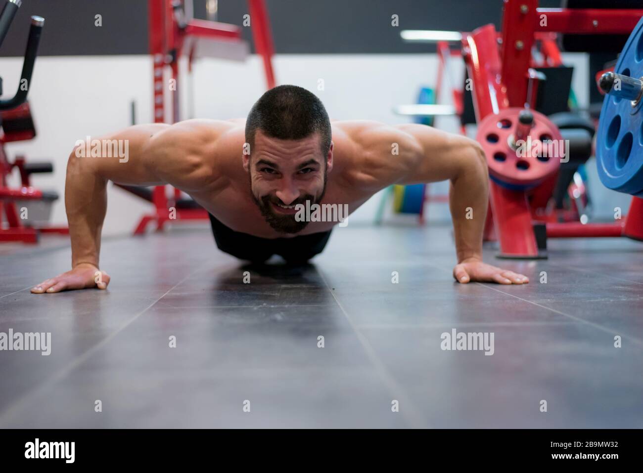 Hard Core Bodybuilding. Muscular athletic bodybuilder fitness model ...