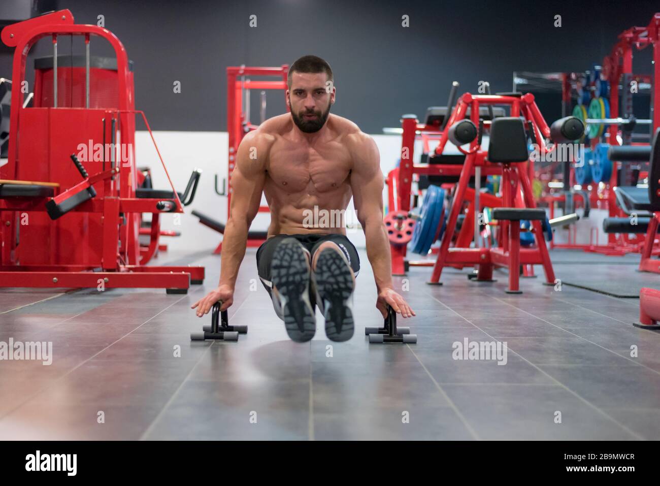 Hard Core Bodybuilding. Muscular athletic bodybuilder fitness model ...