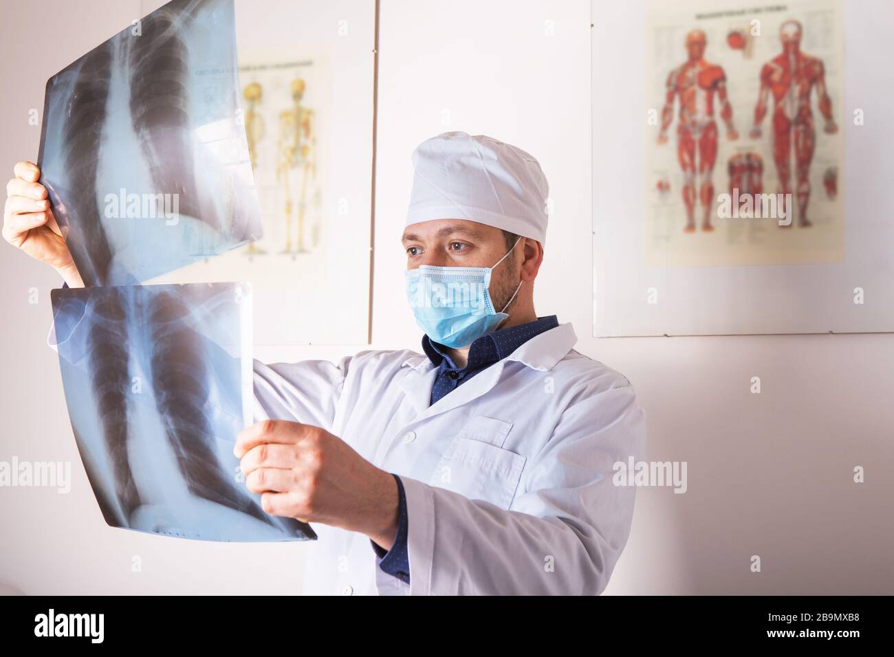 Doctor man with X-ray of lungs, fluorography, roentgen isolated on ...