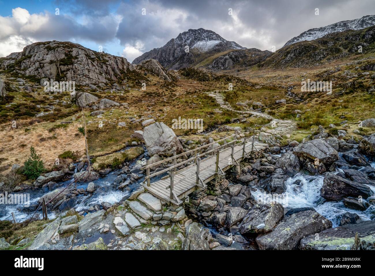 Wooden bridge over a waterfall in the Ogwen valley Snowdonia North ...