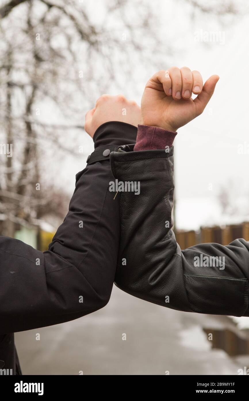 Shaking elbows hi-res stock photography and images - Alamy