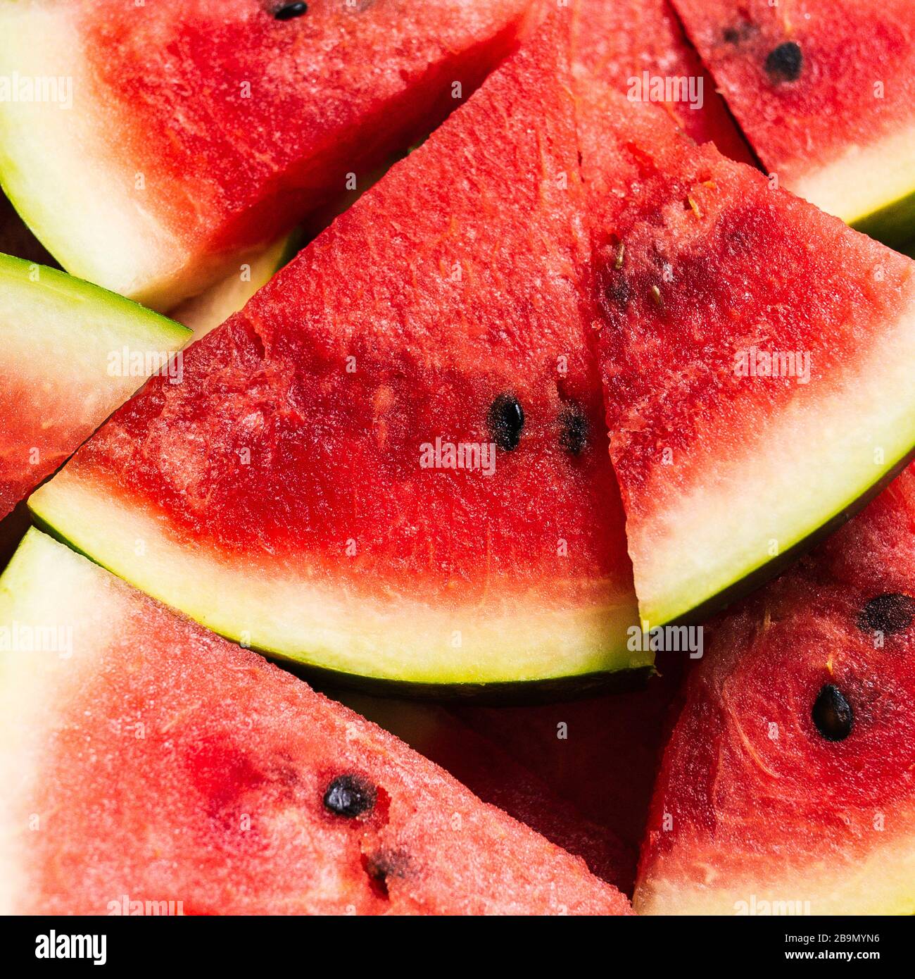 Pieces of watermelon close-up. Slices of a watermelon in a triangular ...