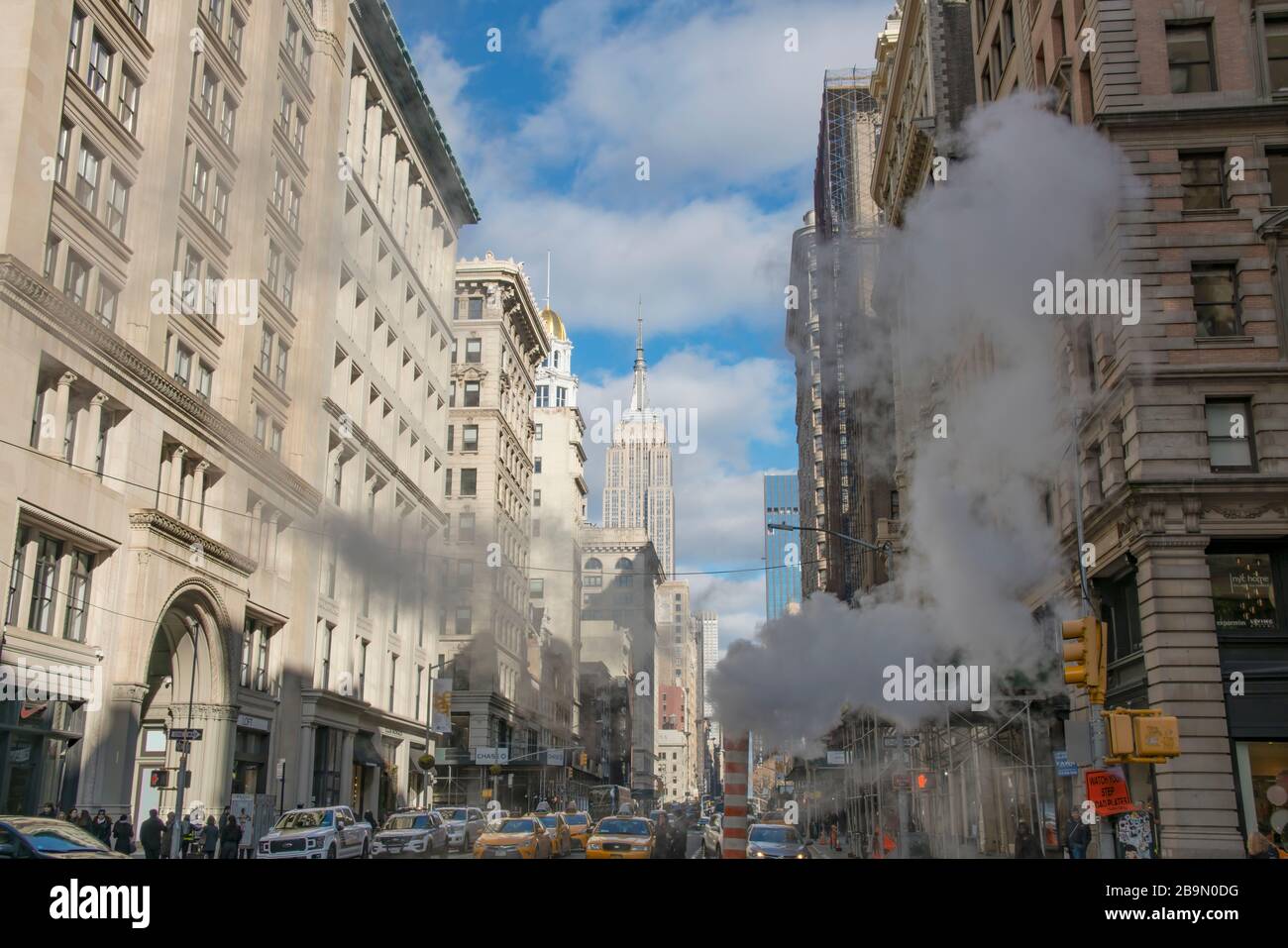 The steam rises and drifts among the Midtown Manhattan buildings in New ...