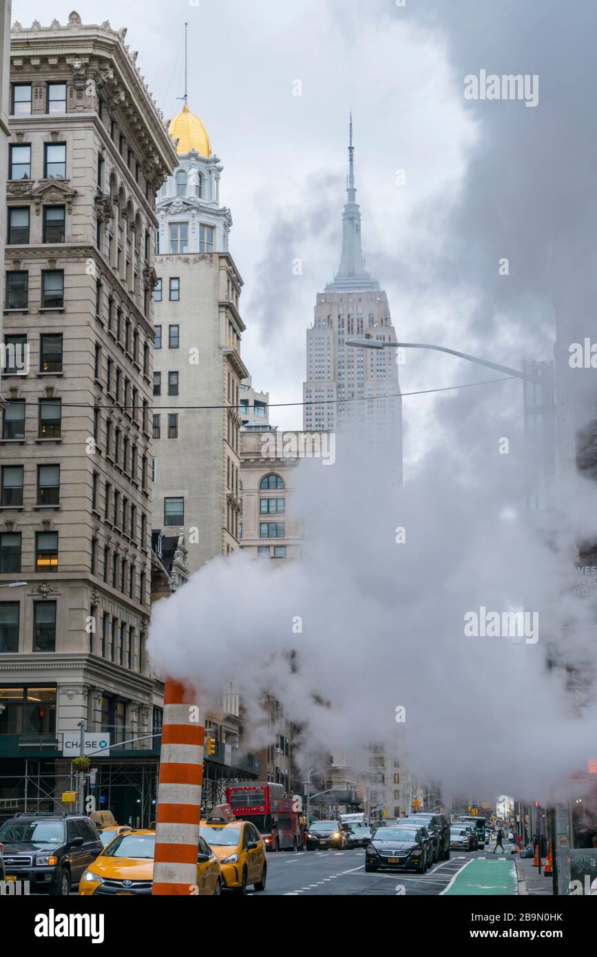 The steam rises and drifts among the Midtown Manhattan buildings in New ...