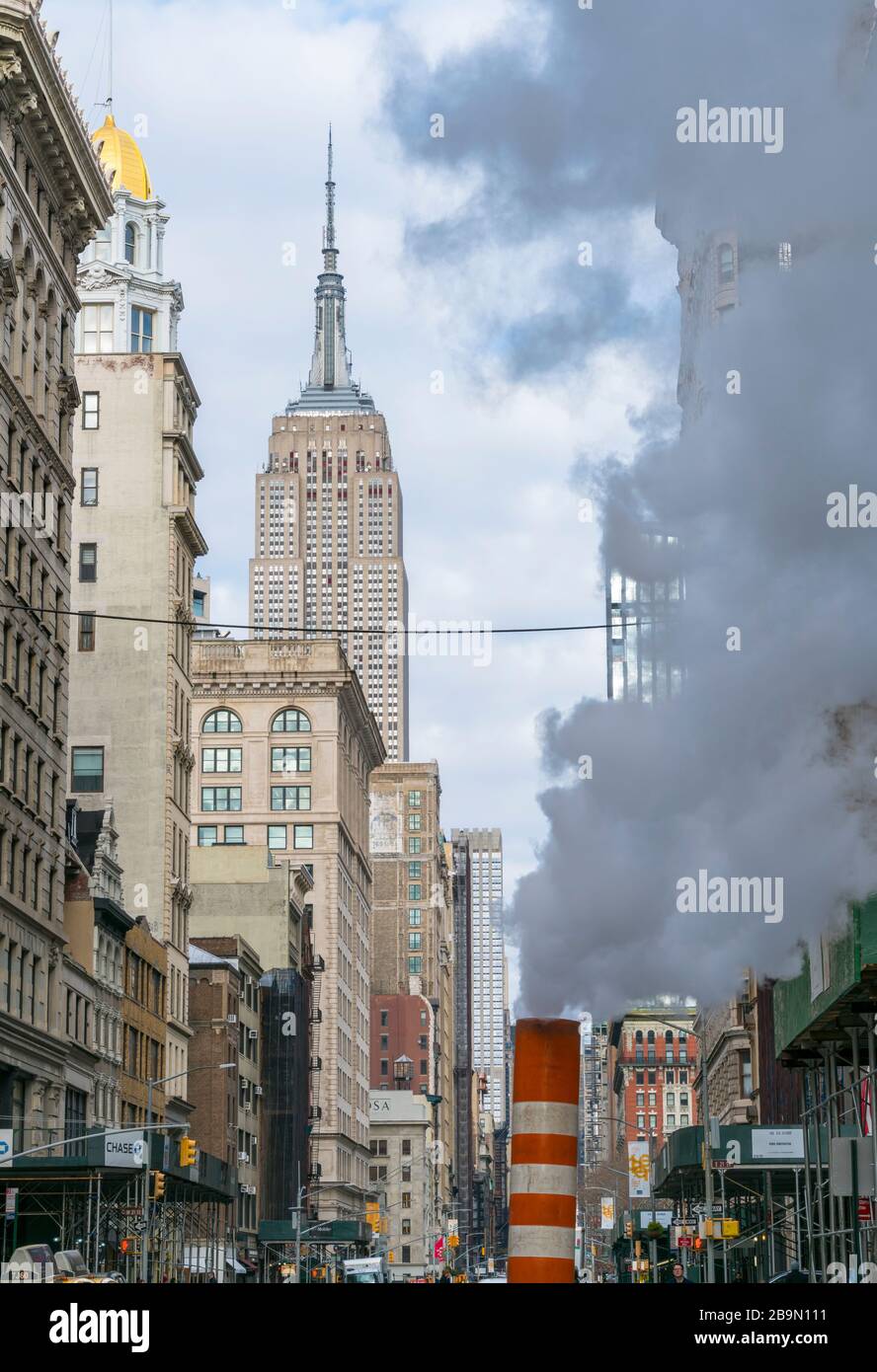The steam rises and drifts among the Midtown Manhattan buildings in New ...