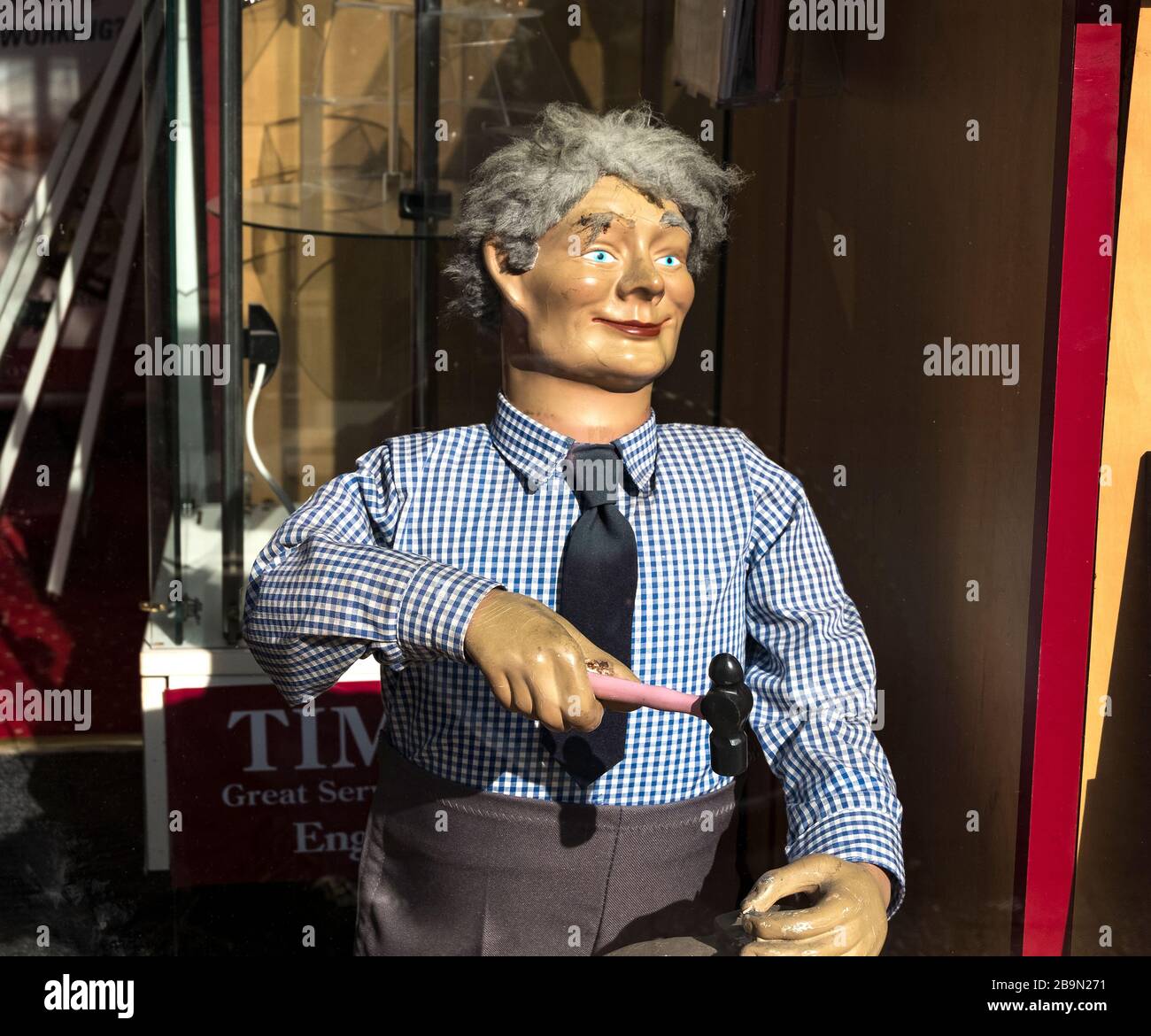 Working model cobbler in a shoe repair shop Stock Photo - Alamy