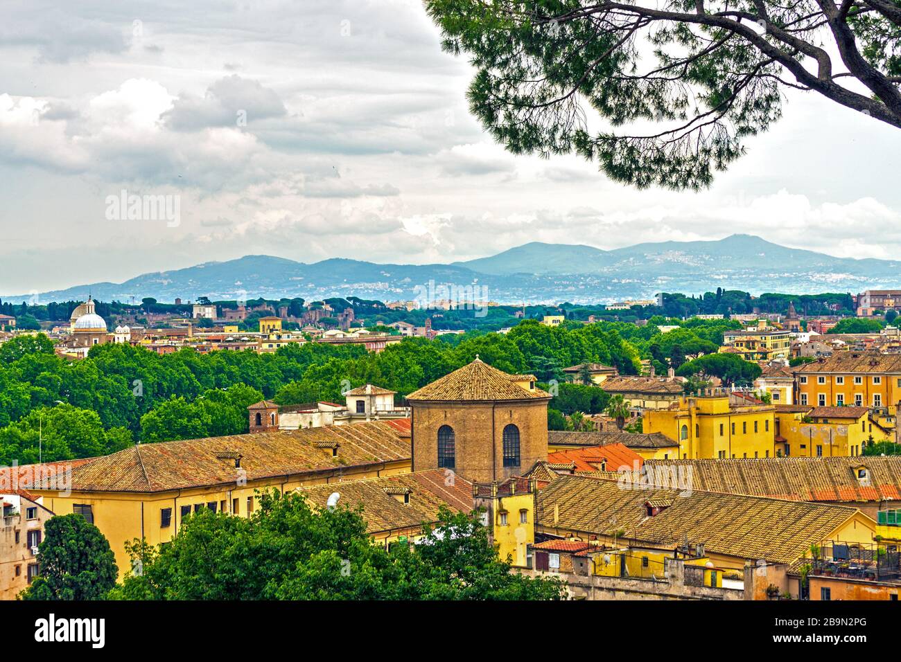 Scenic view of historic Rome city seen through the trees in Parco del ...
