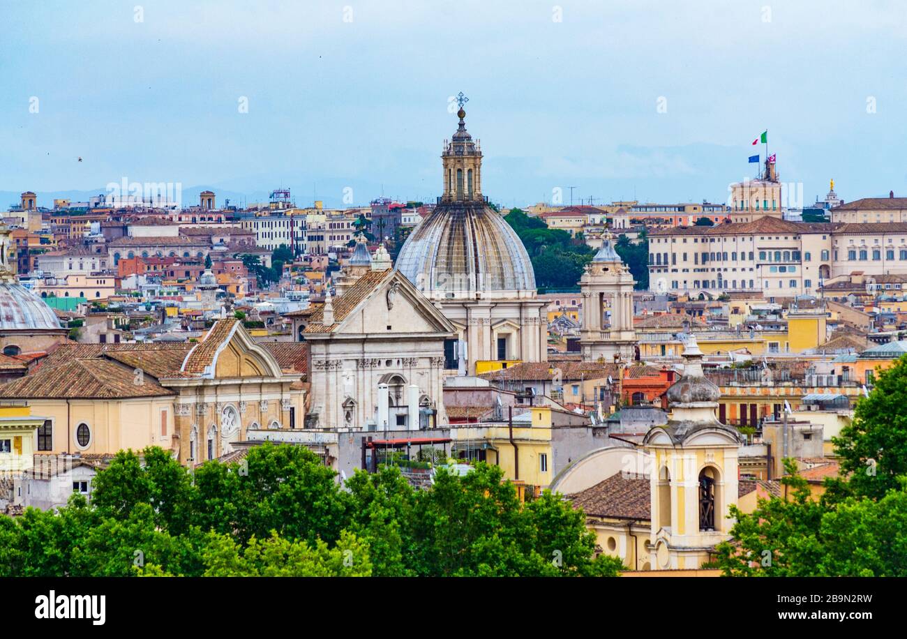 Scenic view of historic Rome city seen through the trees in Parco del ...