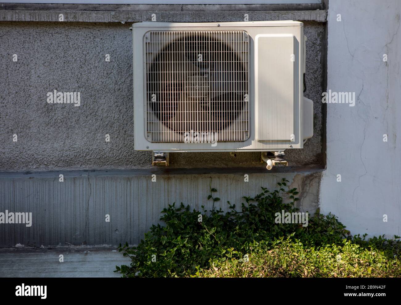 Old facade of a building with an air condition units Stock Photo - Alamy