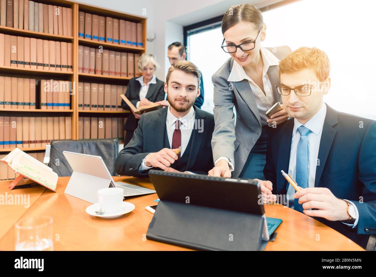 Lawyers working on case reading hi-res stock photography and images - Alamy