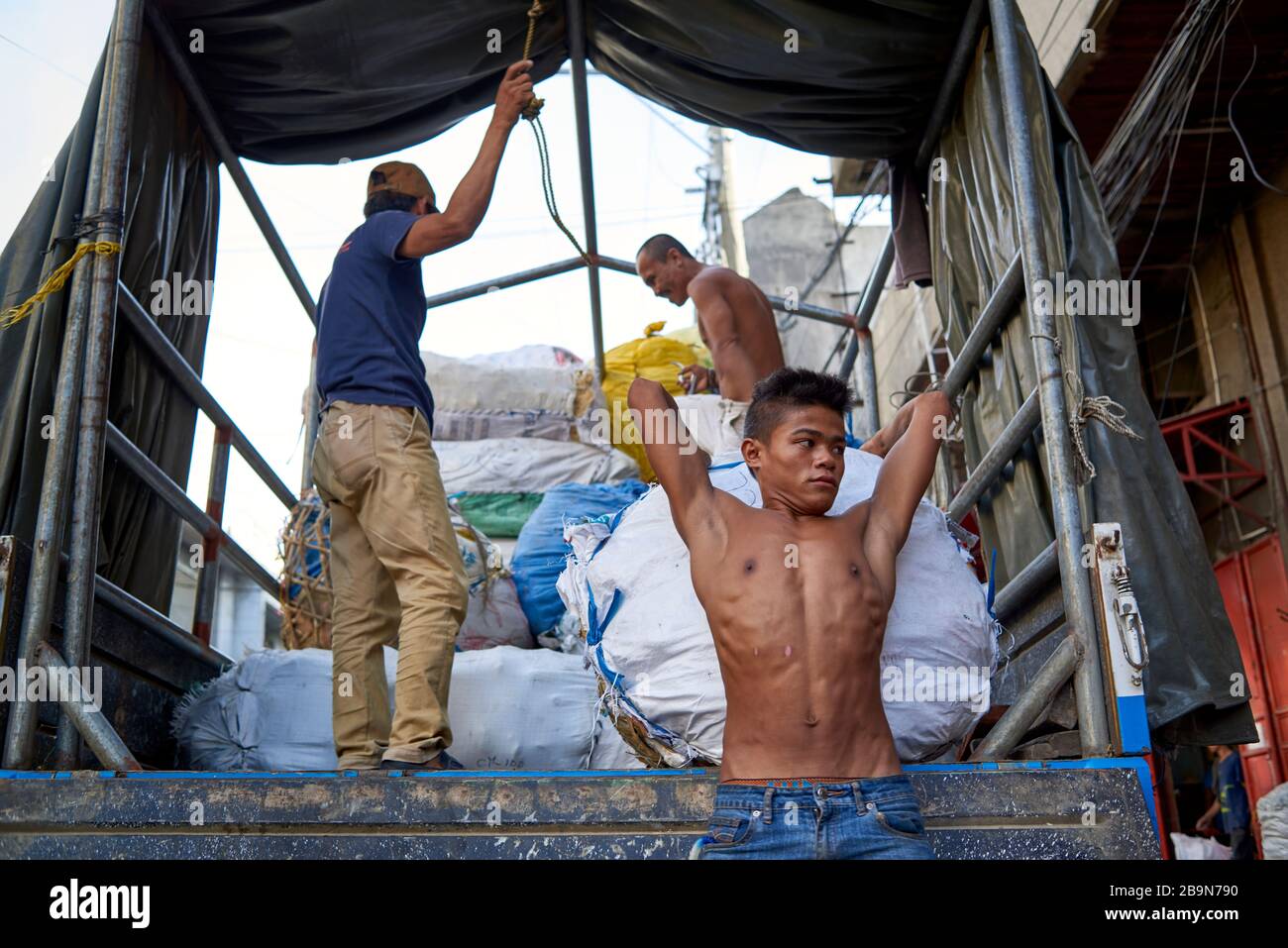 Carrying weighty loads hi-res stock photography and images - Alamy